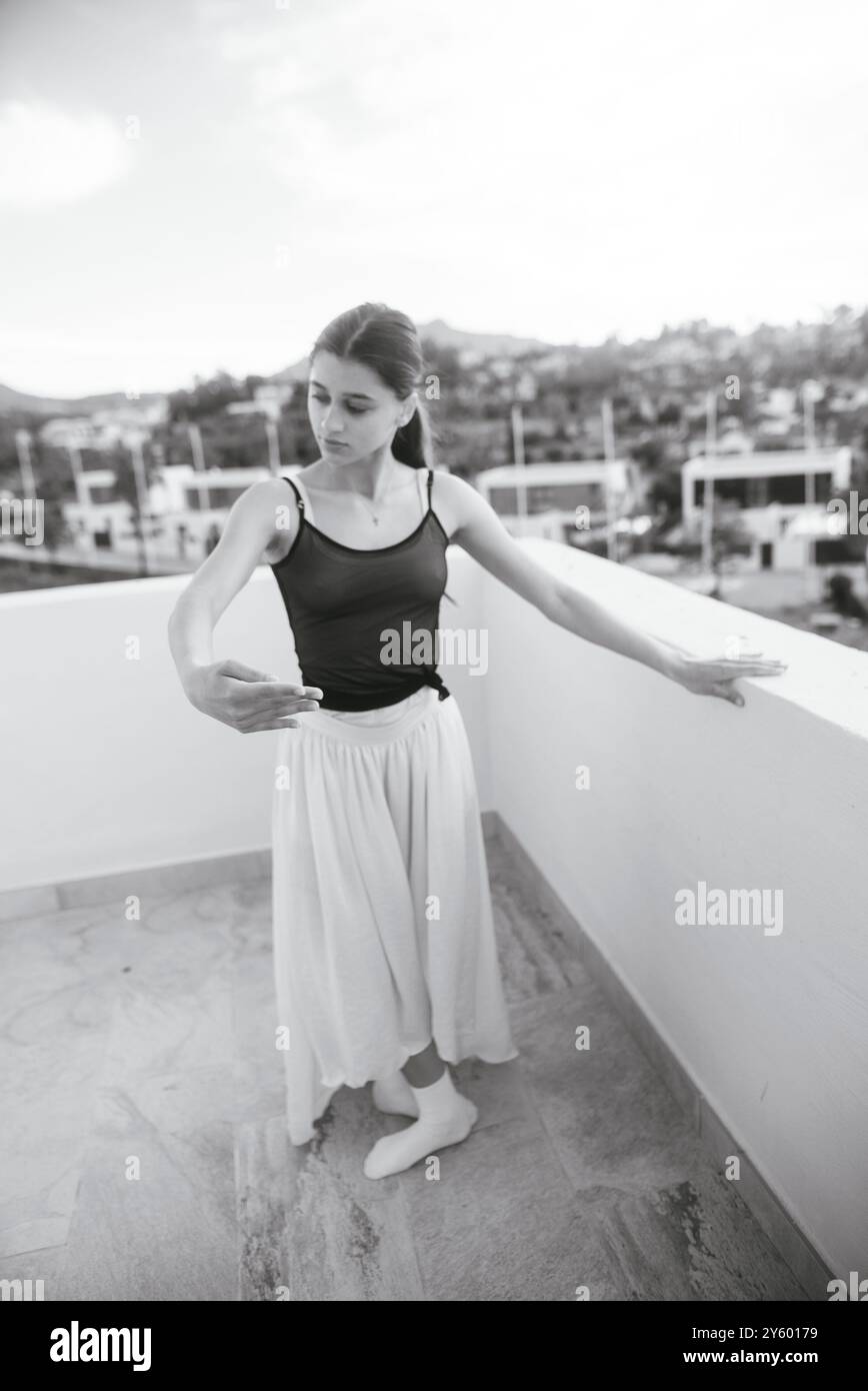 An Elegant Ballet Dancer Gracefully Posing Outdoors in a Beautiful ...