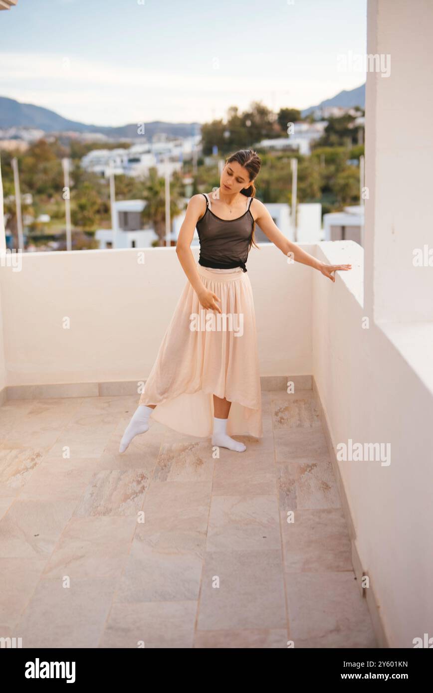 An Elegant Dance Pose Captured on a Beautiful and Scenic Terrace with ...