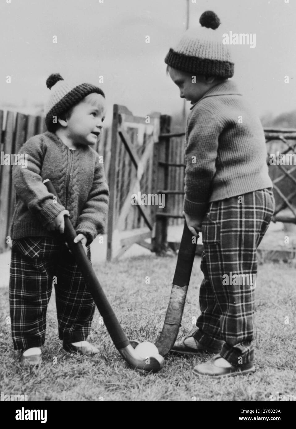 Children playing hockey Black and White Stock Photos & Images - Alamy