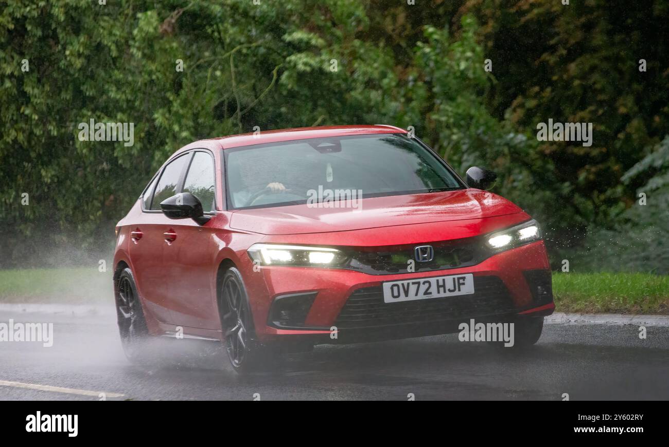 Milton Keynes,UK - Sept 22nd 2024: 2023 red hybrid electric Honda Civic ...