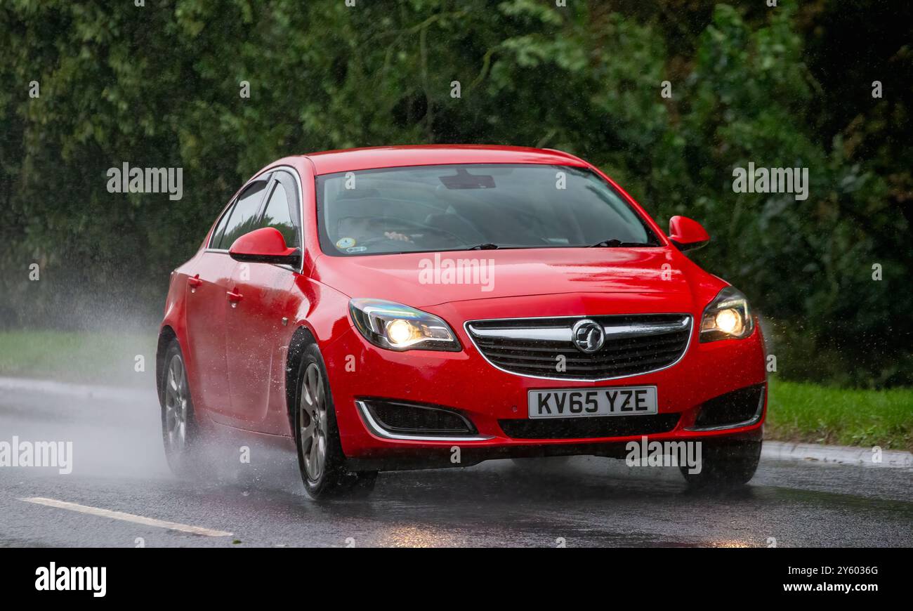 Milton Keynes,UK - Sept 22nd 2024: 2015 red diesel engine Vauxhall ...