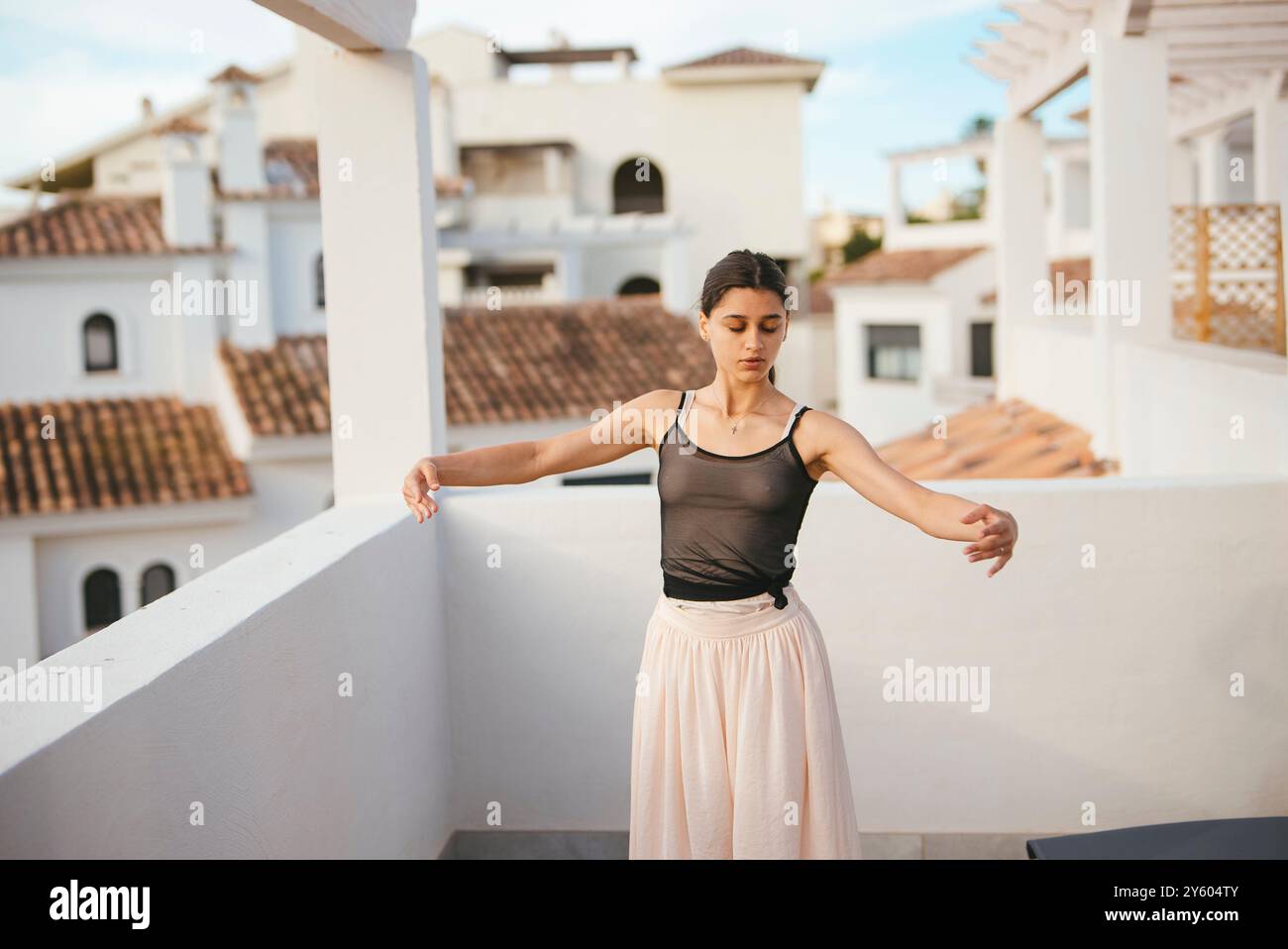 Graceful Dance Posing Elegantly on a Beautiful Terrace with a Stunning ...