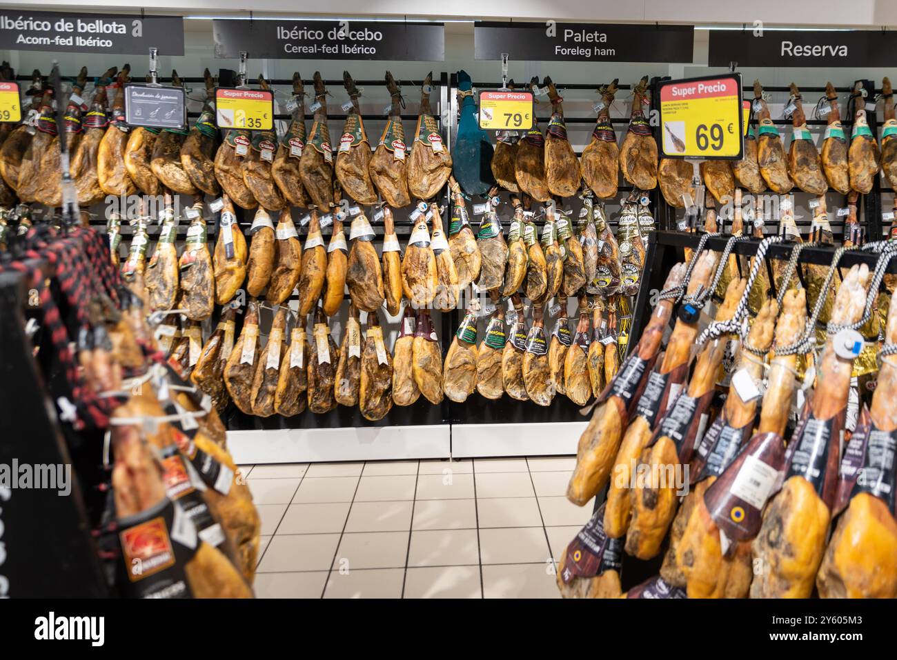 A range of Iberian hams on sale in a supermarket in Spain. Jamón ...