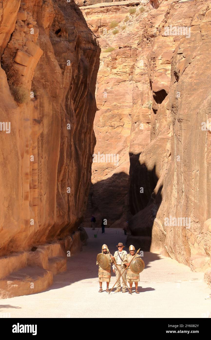 Petra, Wadi Musa in Jordan - May 13 2024: people walk trough the Siq ...