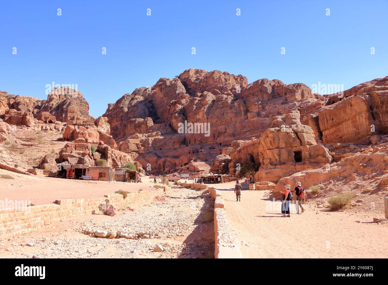 Petra, Wadi Musa in Jordan - May 13 2024: people walk trough the ...