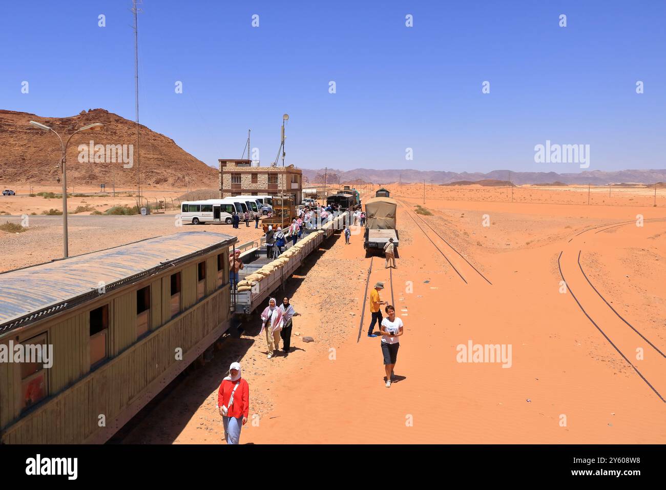 Wadi Rum in Jordan - May 15 2024: people visit the old Locomotive train ...