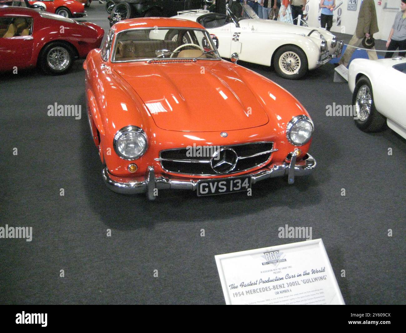 An orange 1954 Mercedes-Benz 300SL Gullwing at a car show at Annual ...