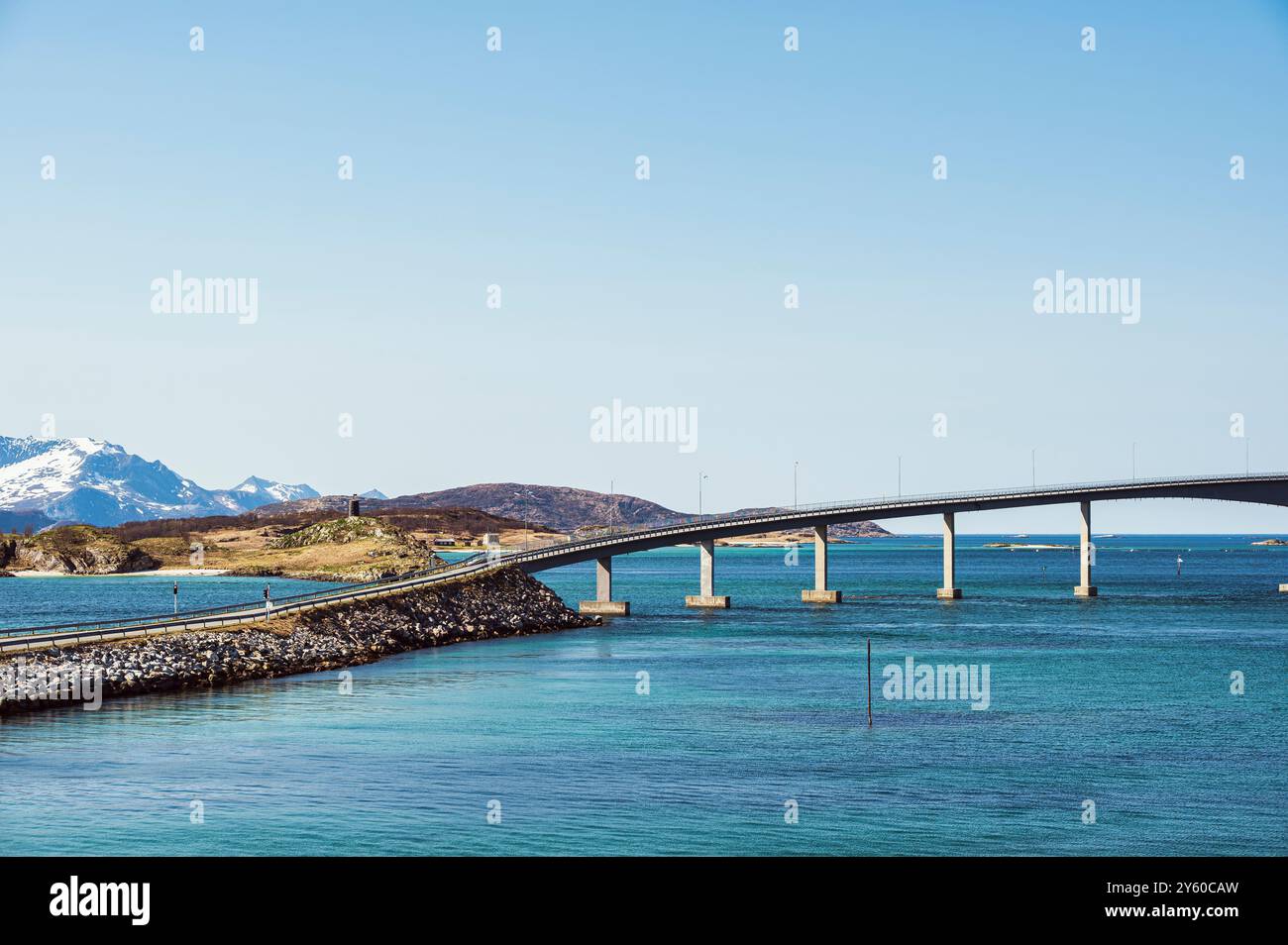 a bridge inside the island of Sommaroy with a clear sky in the ...
