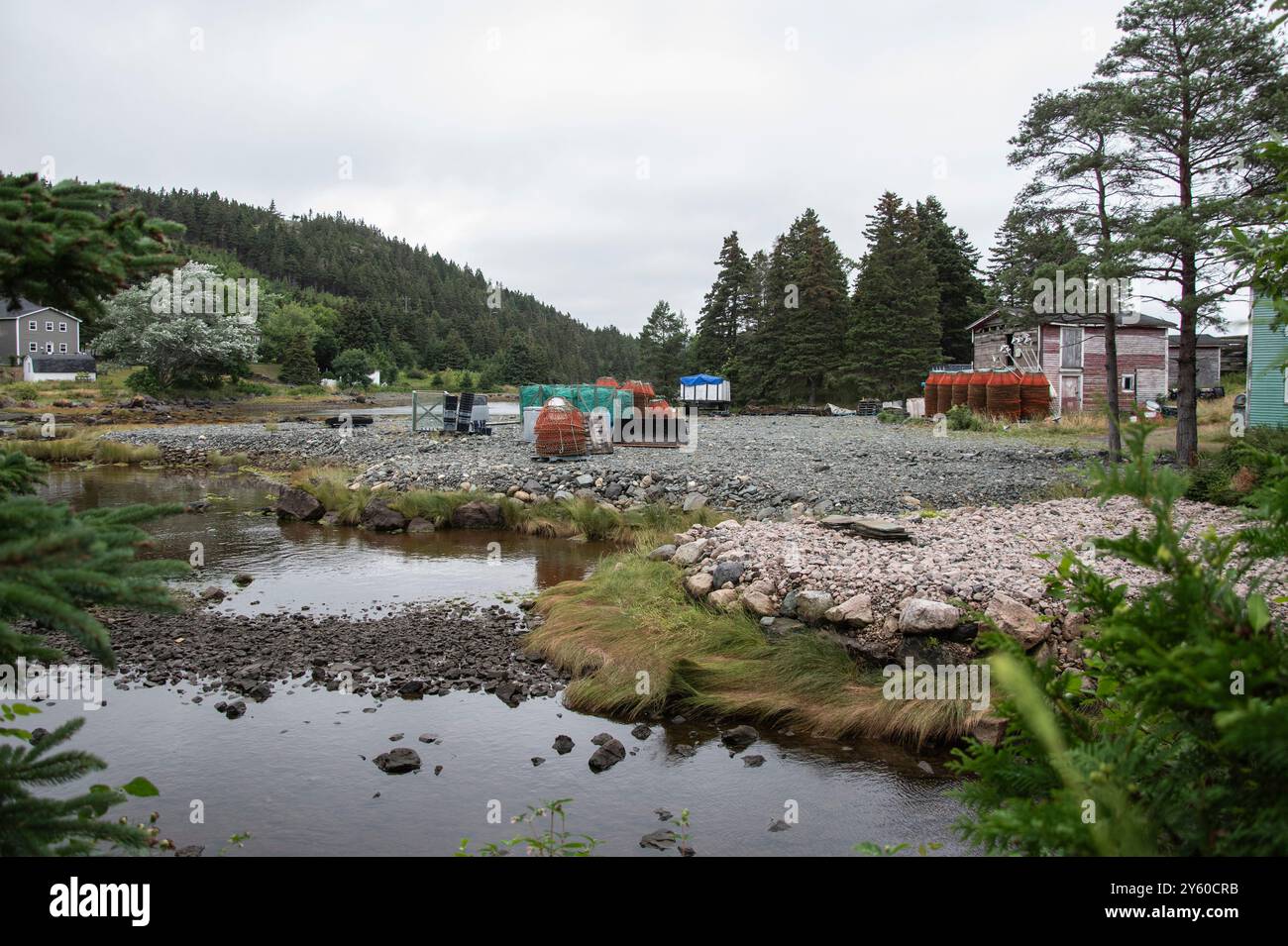 Crab traps and fishing shed on the beach in Conception Harbour ...