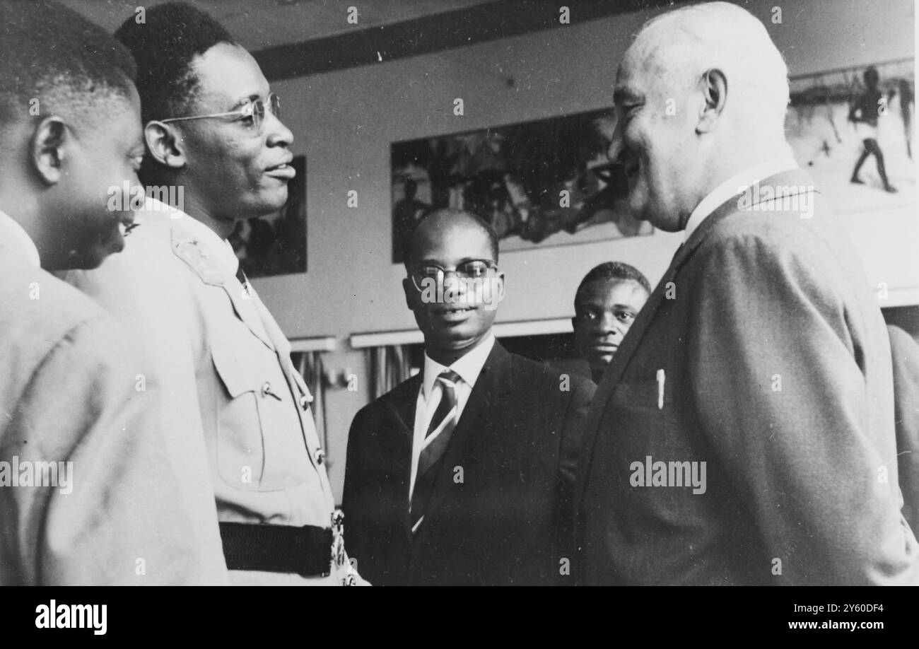 COLONEL JOSEPH MOBUTU CHATS WITH GERARD CRAVATIE IN KASAI, CONGO 6 ...