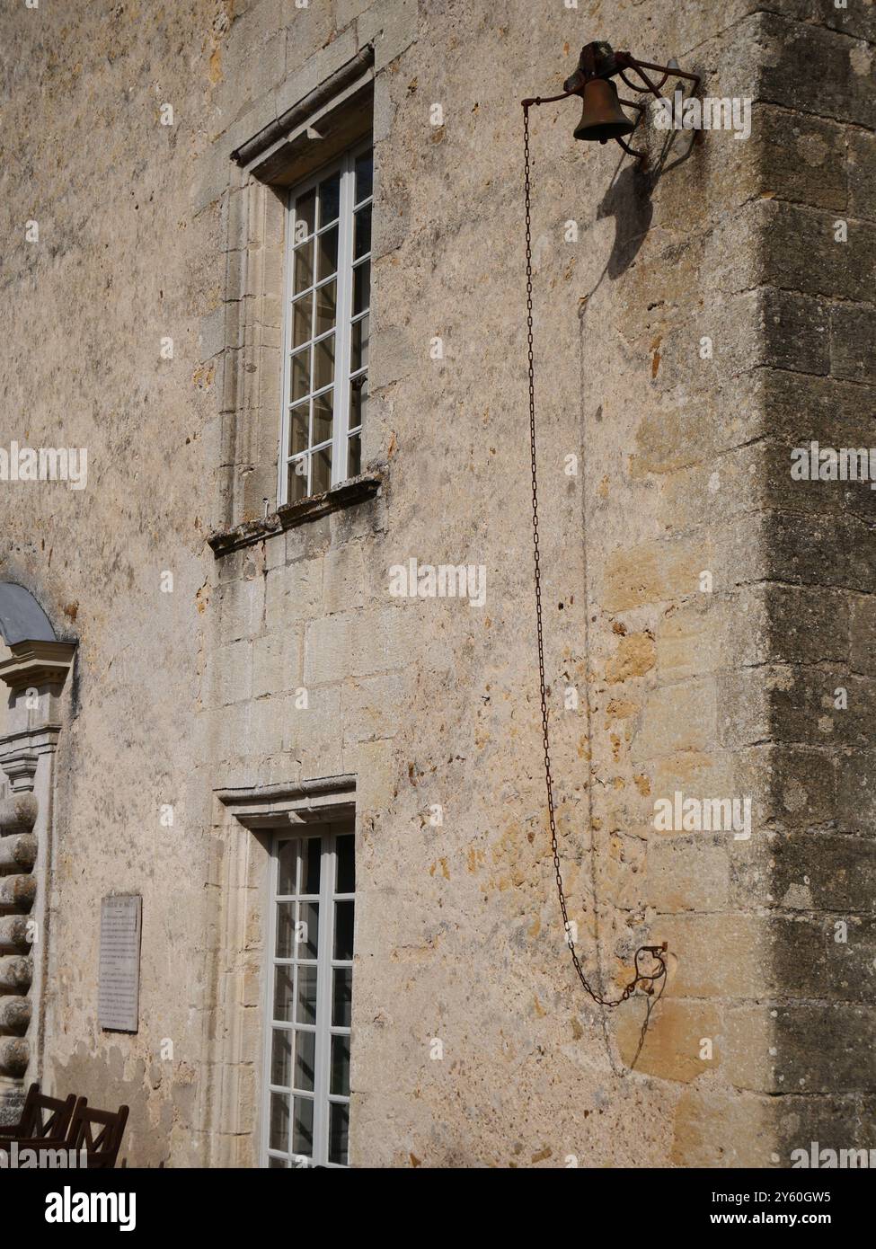 Long bell pull cord on the exterior of an historic house property in ...