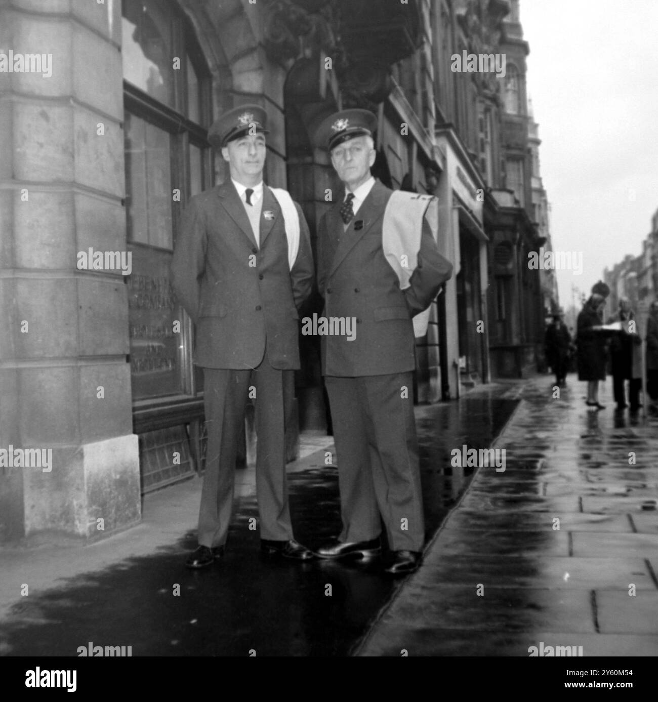 HALSEY ERNEST MODELS POSTMAN UNIFORM / 24 NOVEMBER 1960 Stock Photo - Alamy