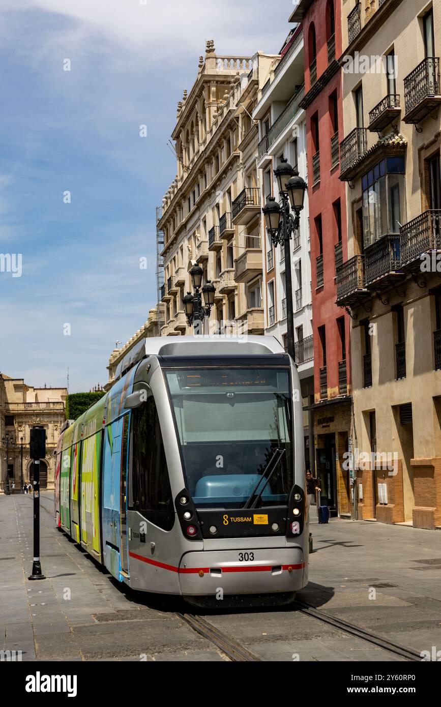 A tram makes its way through the streets of Seville, Spain Stock Photo ...