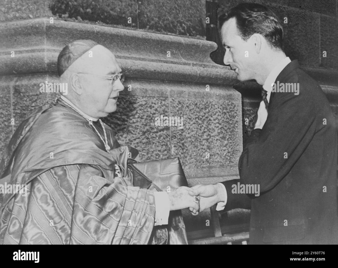 Cancer victim Dr Thomas Dooley (right) is welcomed by Francis Cardinal ...