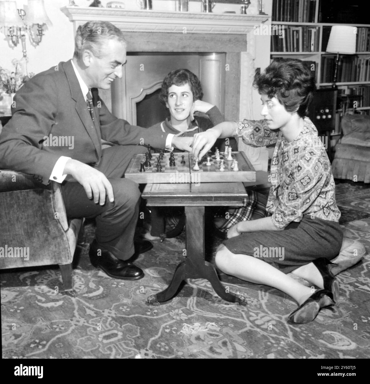 1960 family playing Black and White Stock Photos & Images - Alamy