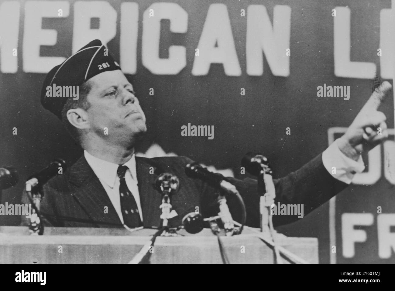 Complete with Legion cap , Senator John F Kennedy addresses the 42nd ...