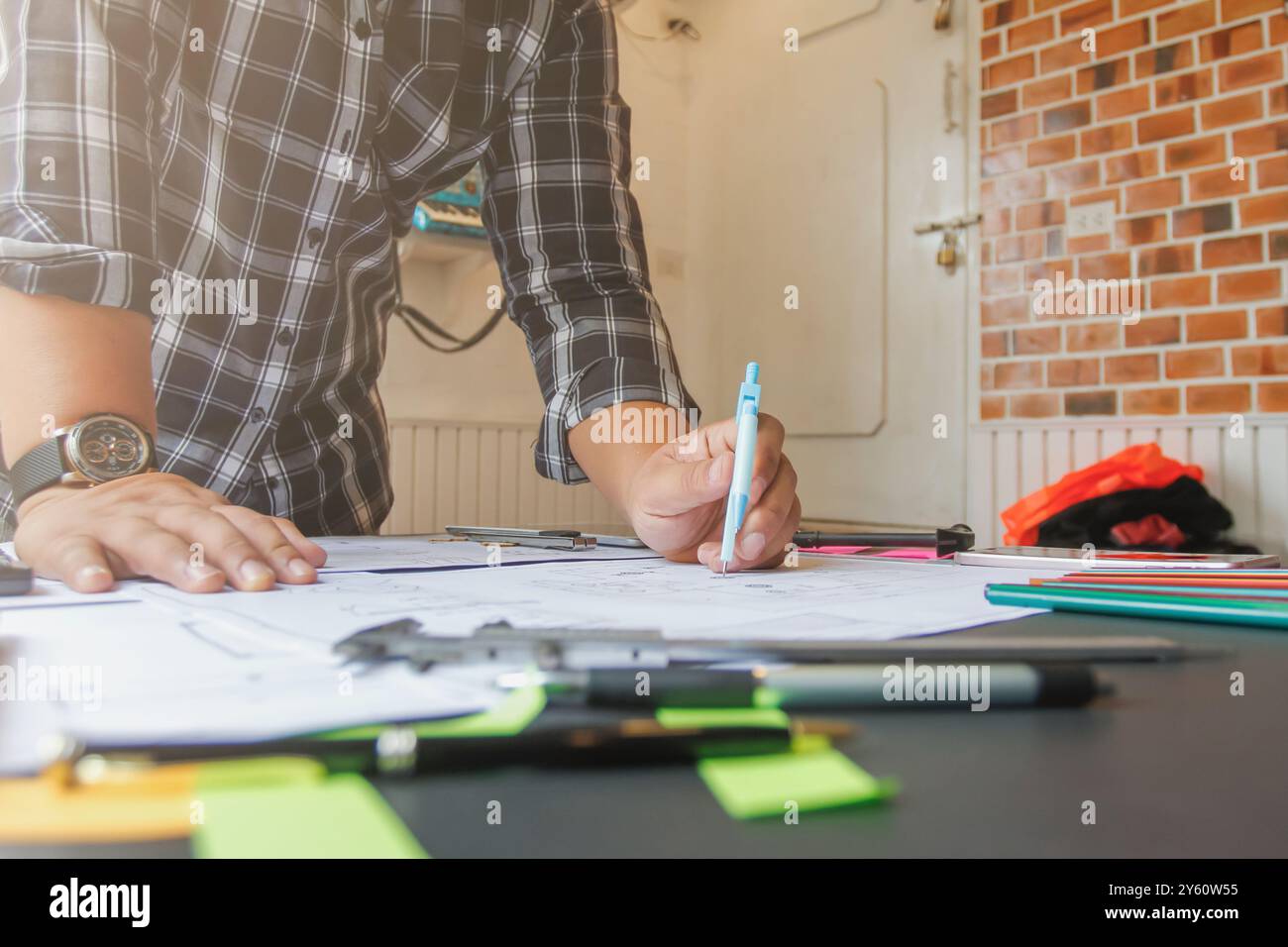 architect prepares blueprints for engineers to check blueprints before ...