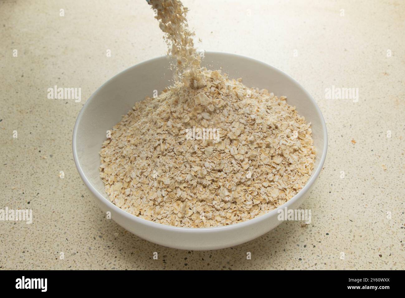 Close up oats flakes pouring hi-res stock photography and images - Alamy