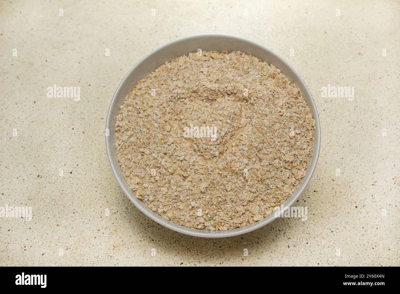 Oatmeal texture in a bowl with love in it, carbohydrates, top view with ...