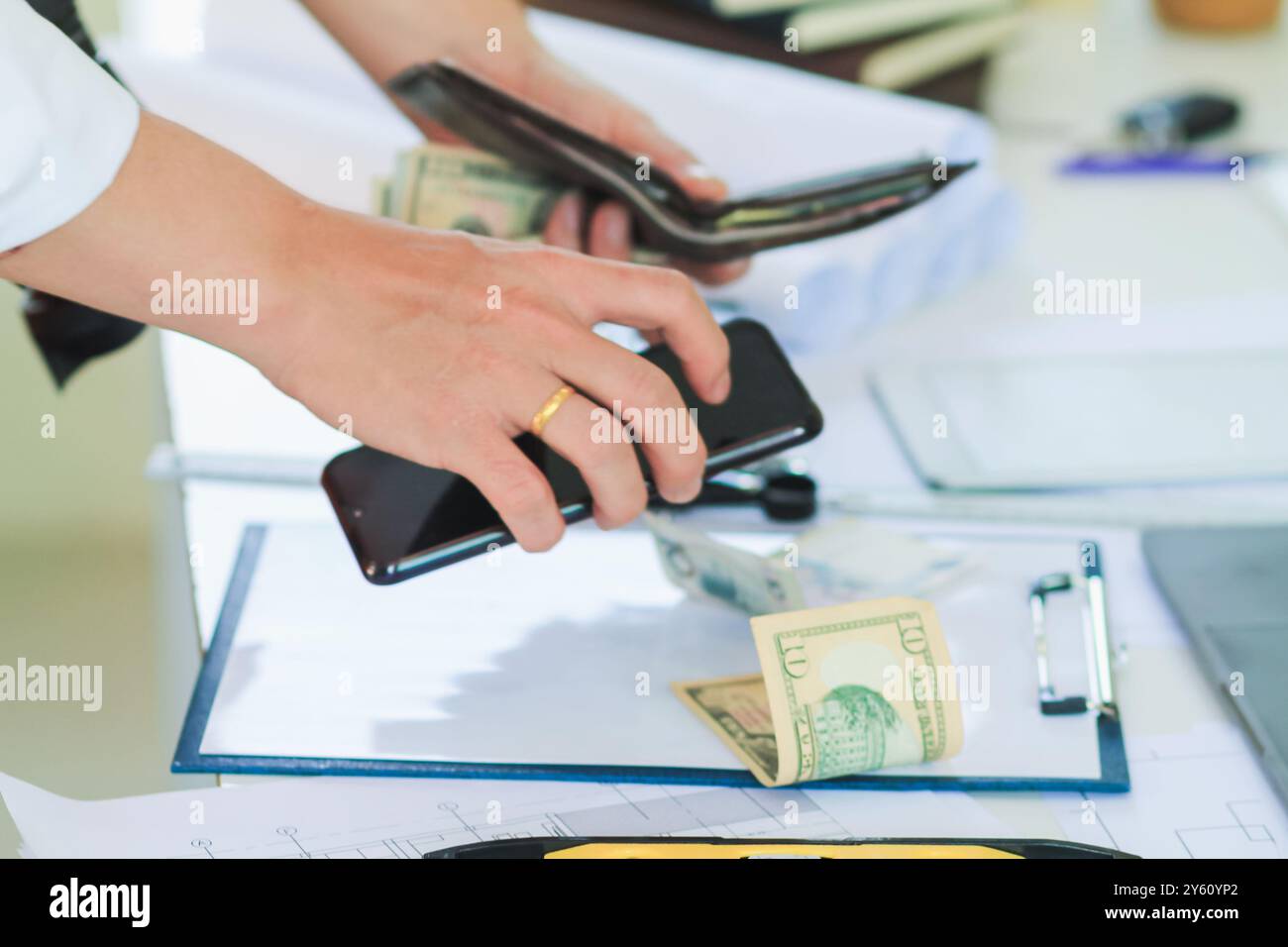 Engineers and Foreman are calculating workers' expenses and overtime to ...