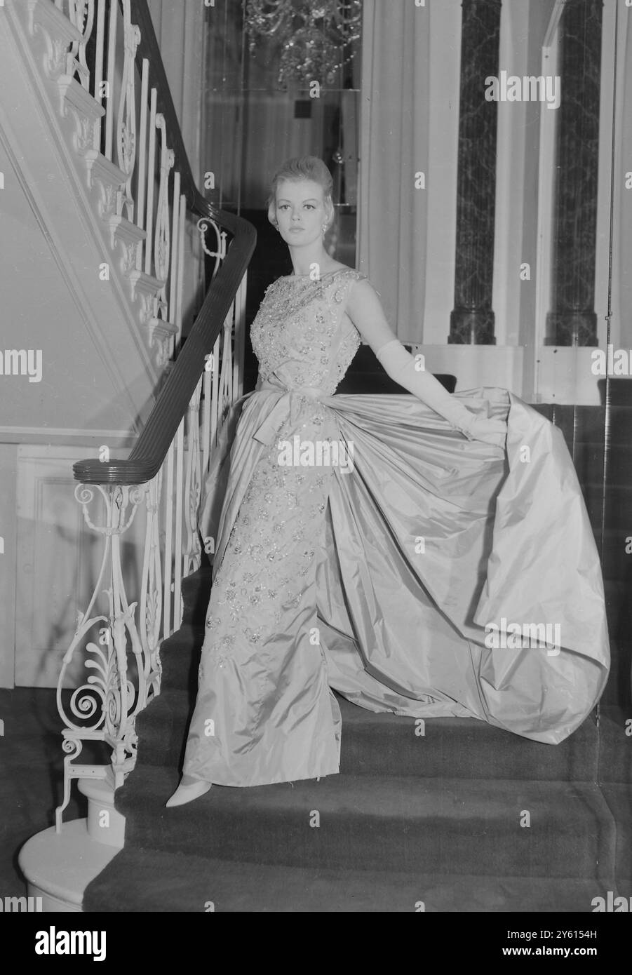 MATHILDA MODELS DRESS BY HARTNELL / 29 JULY 1960 Stock Photo - Alamy