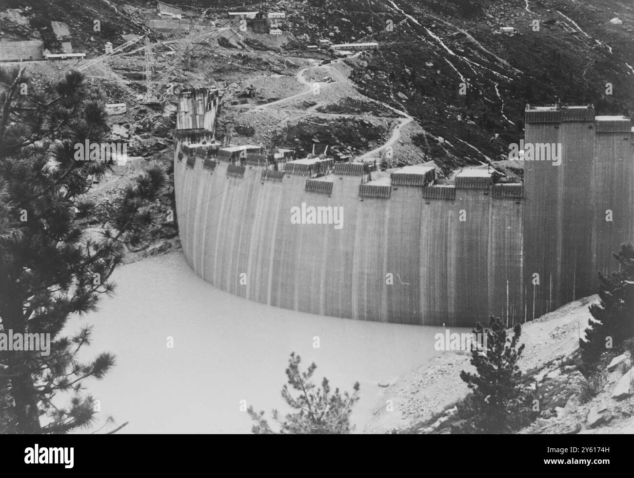 DAMS DOUBLE BENT BOW DAM IN SWITZERLAND 15 JULY 1960 Stock Photo - Alamy