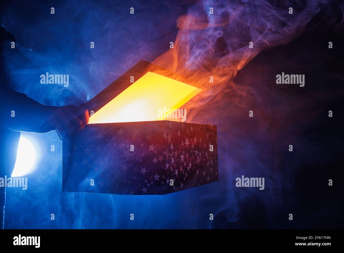 magic surprise box on dark background with smoke, discount and sale ...