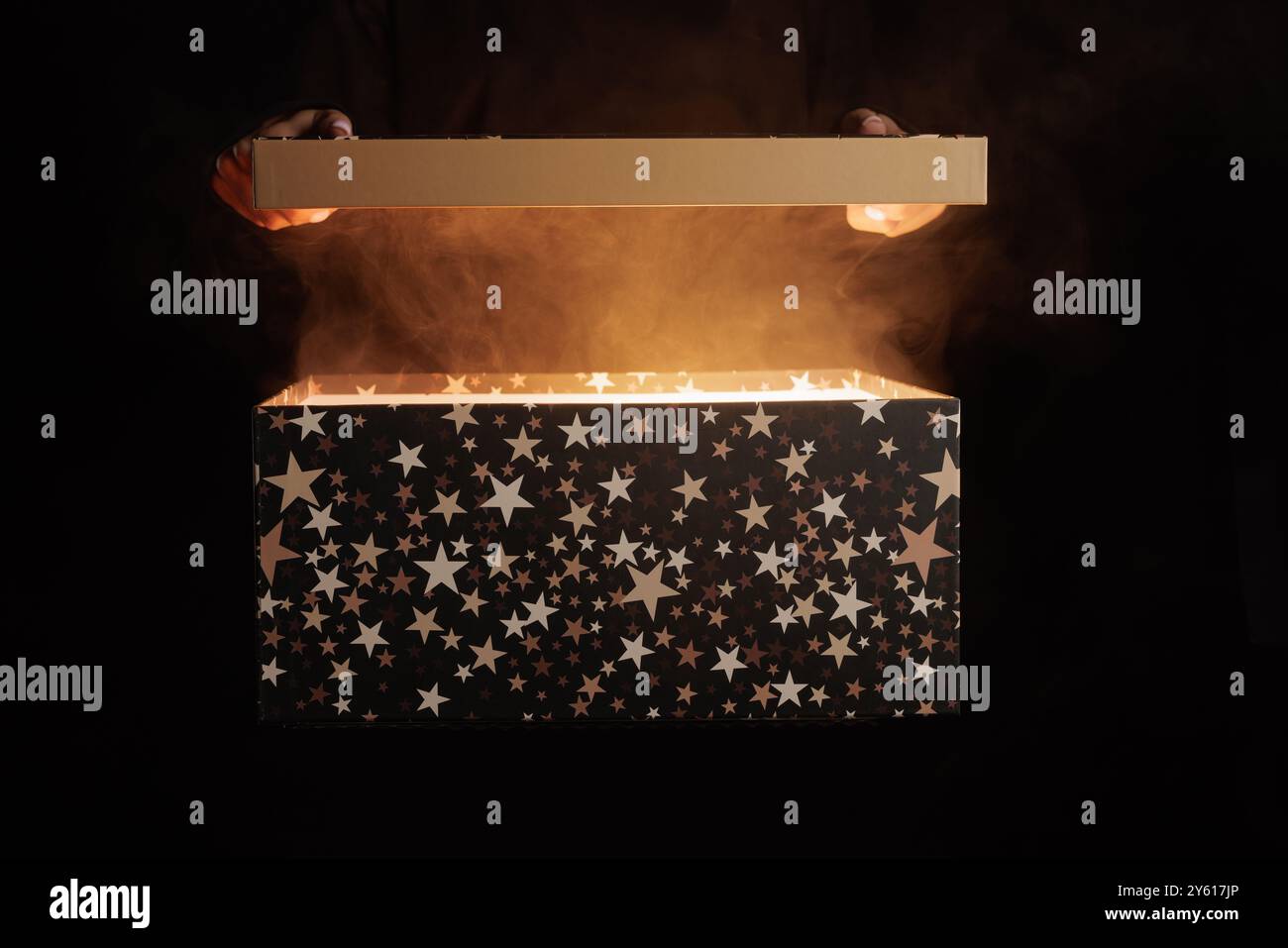 magic surprise box on dark background with smoke, discount and sale ...