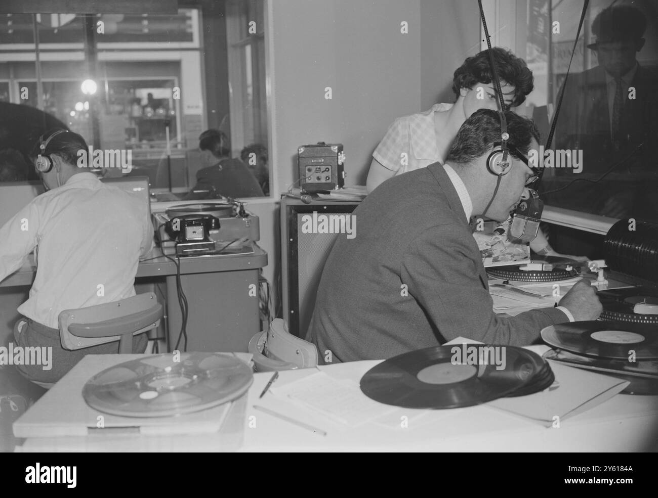 ASSISTANT VALERIE SINGLETON WITH ANNOUNCER PETER COBURN IN CAMBRIDGE ...