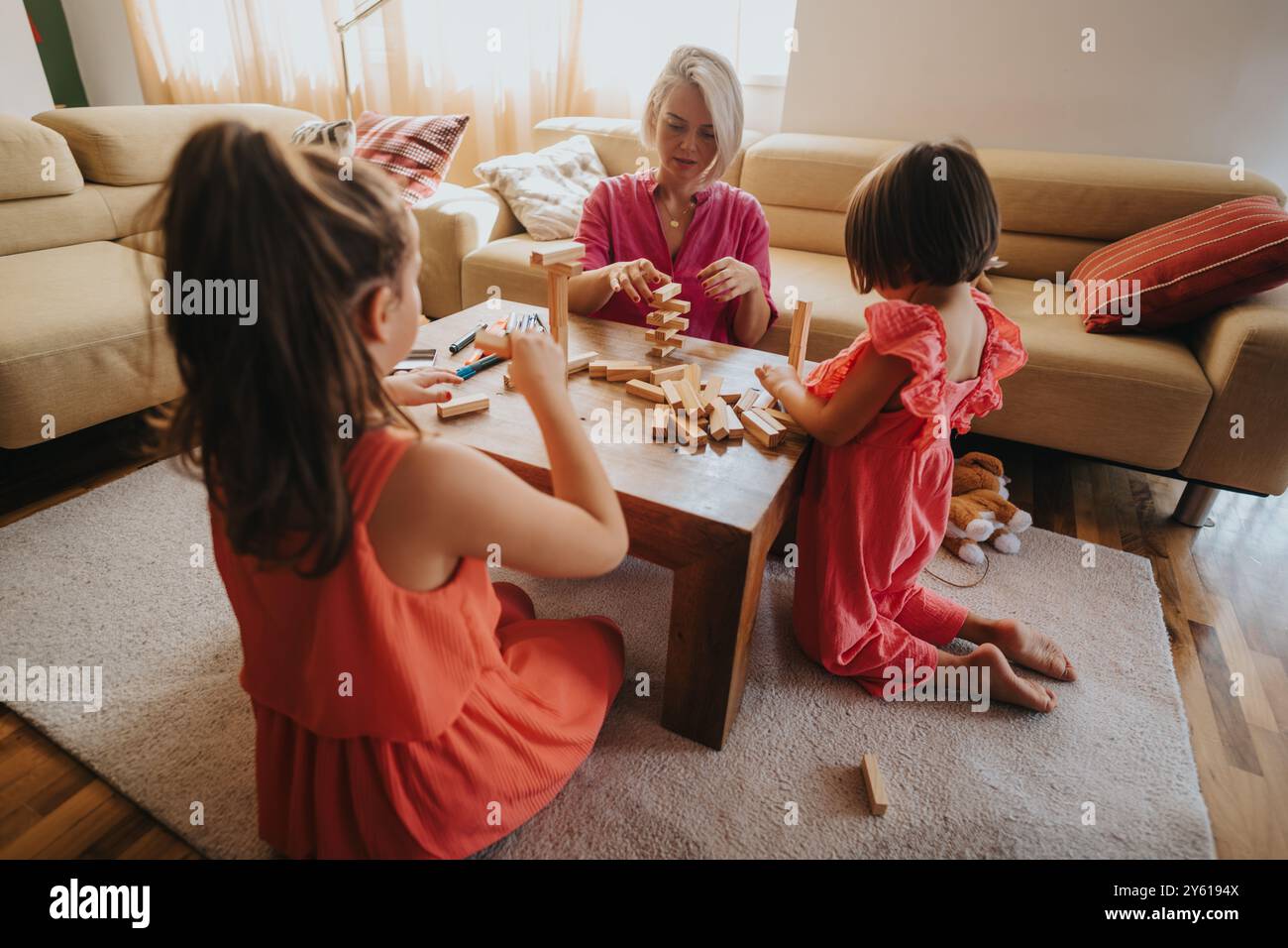 Family bonding wooden block hi-res stock photography and images - Alamy