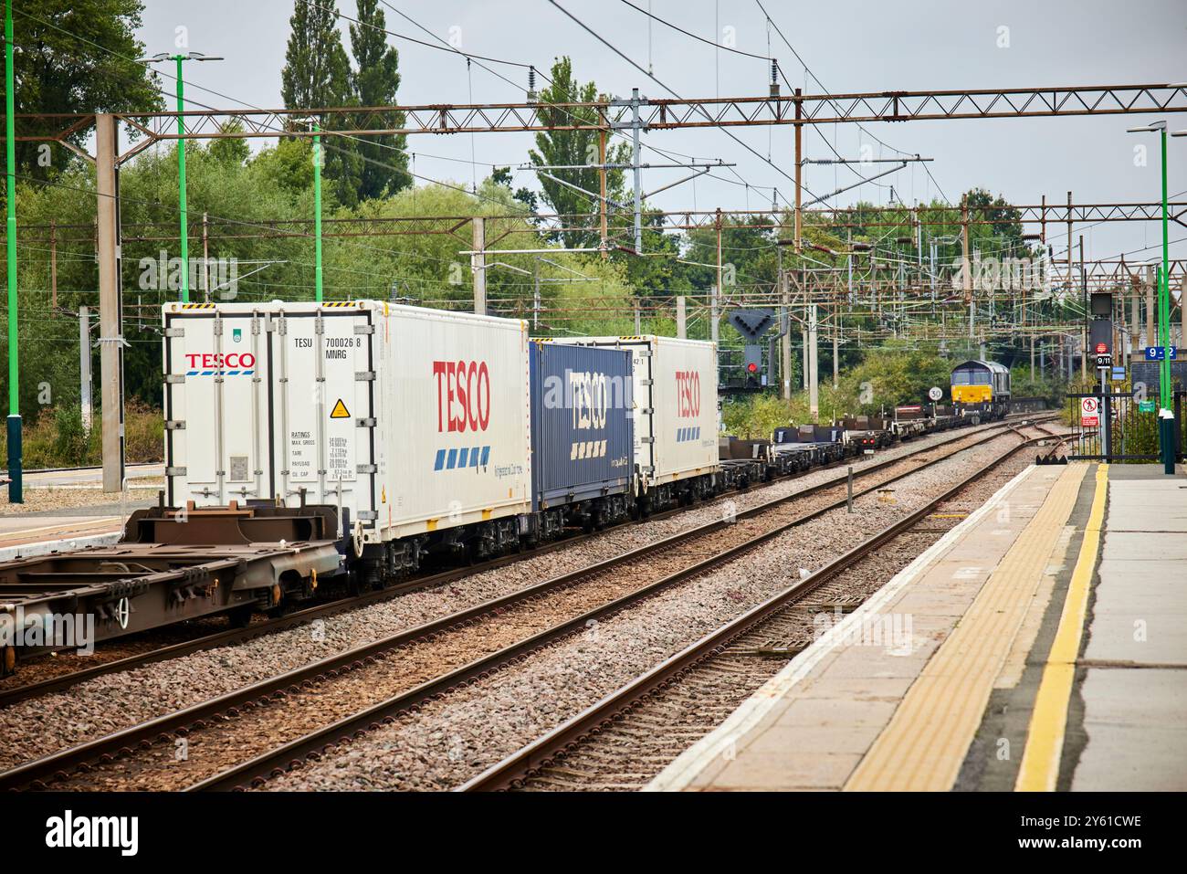 Freight cargo train passing railroad hi-res stock photography and images - Alamy