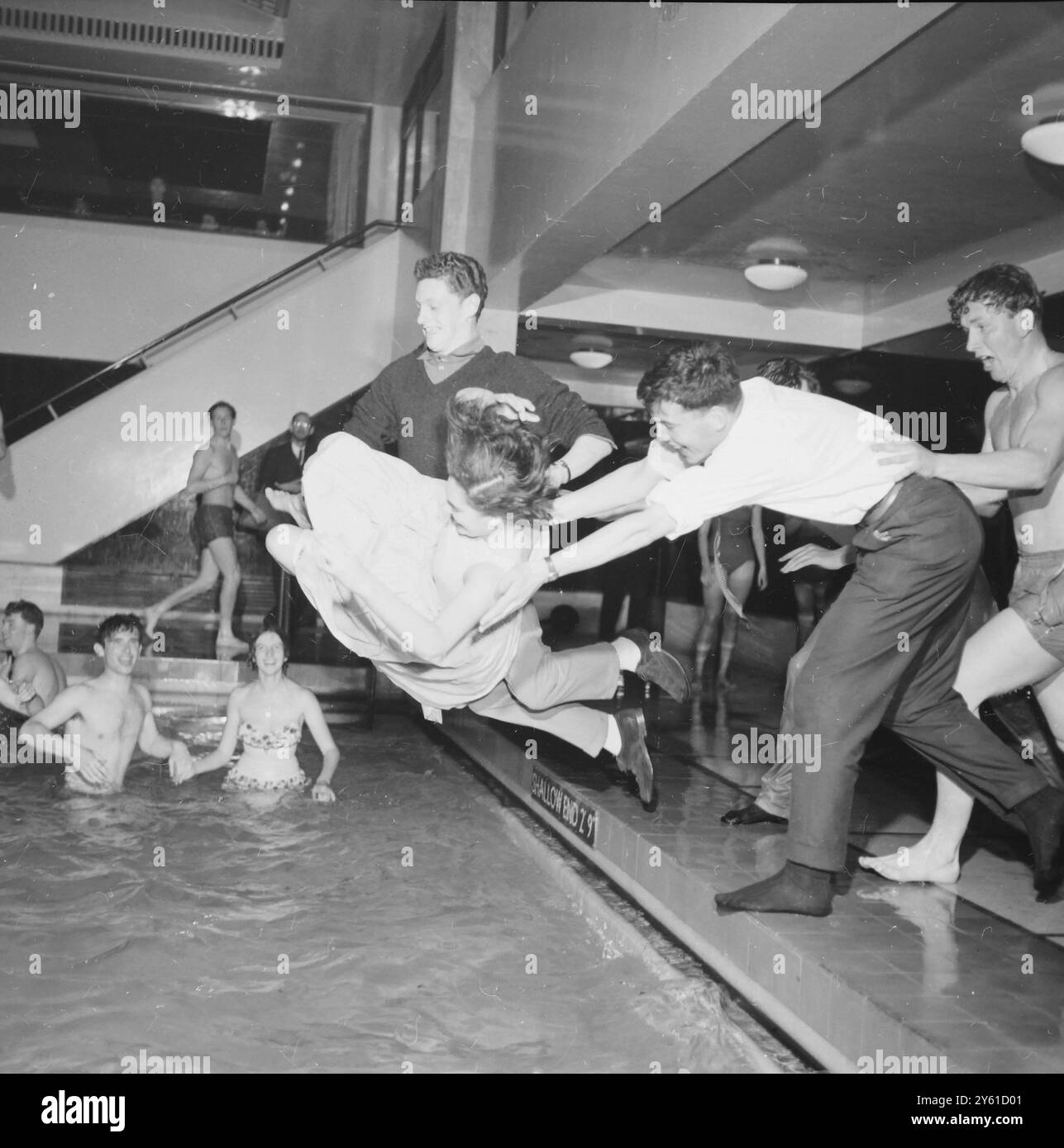 Thrown into pool Black and White Stock Photos & Images - Alamy