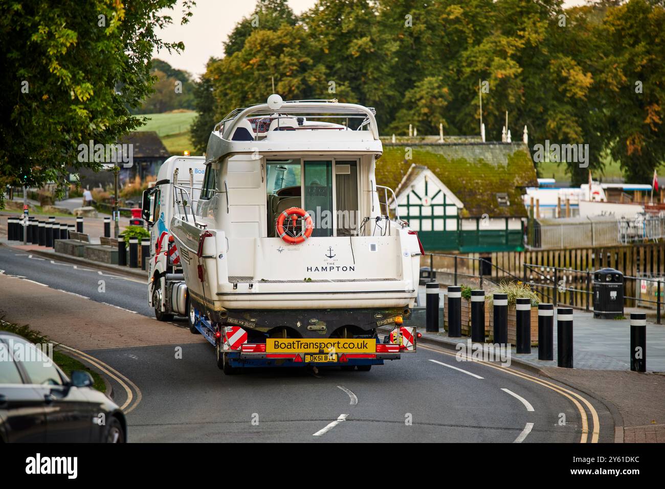 A large lorrry waking its way through Windermere in the Lake District ...