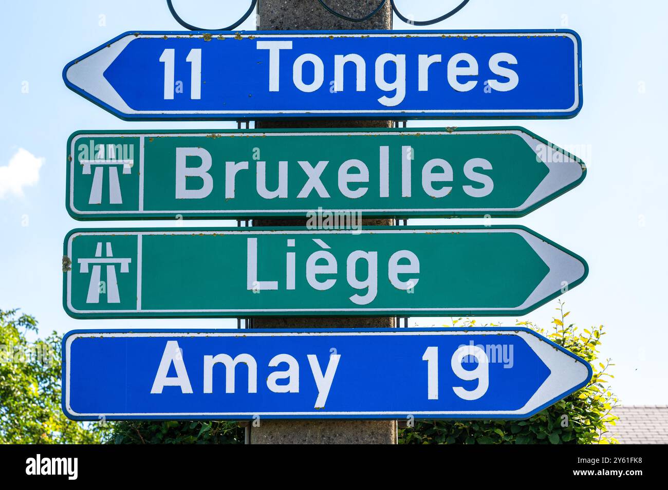 Crisnée, Wallonia, Belgium, AUG 10, 2024 - Road signs to cities and the ...