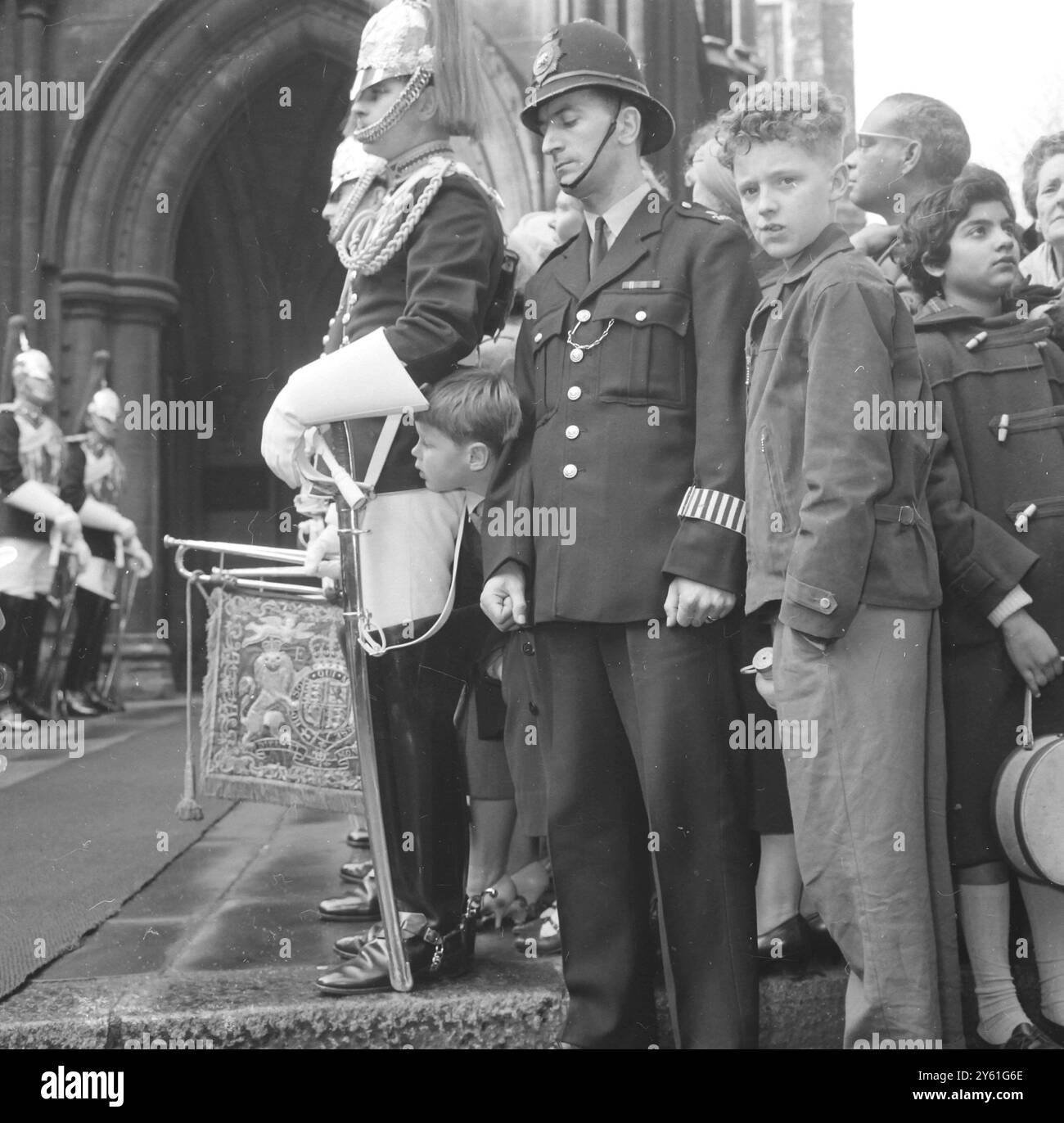 A POLICEMAN , SOLDIER AND LITTLE BOY AT MARCIA KENDREW ' S WEDDING TO ...