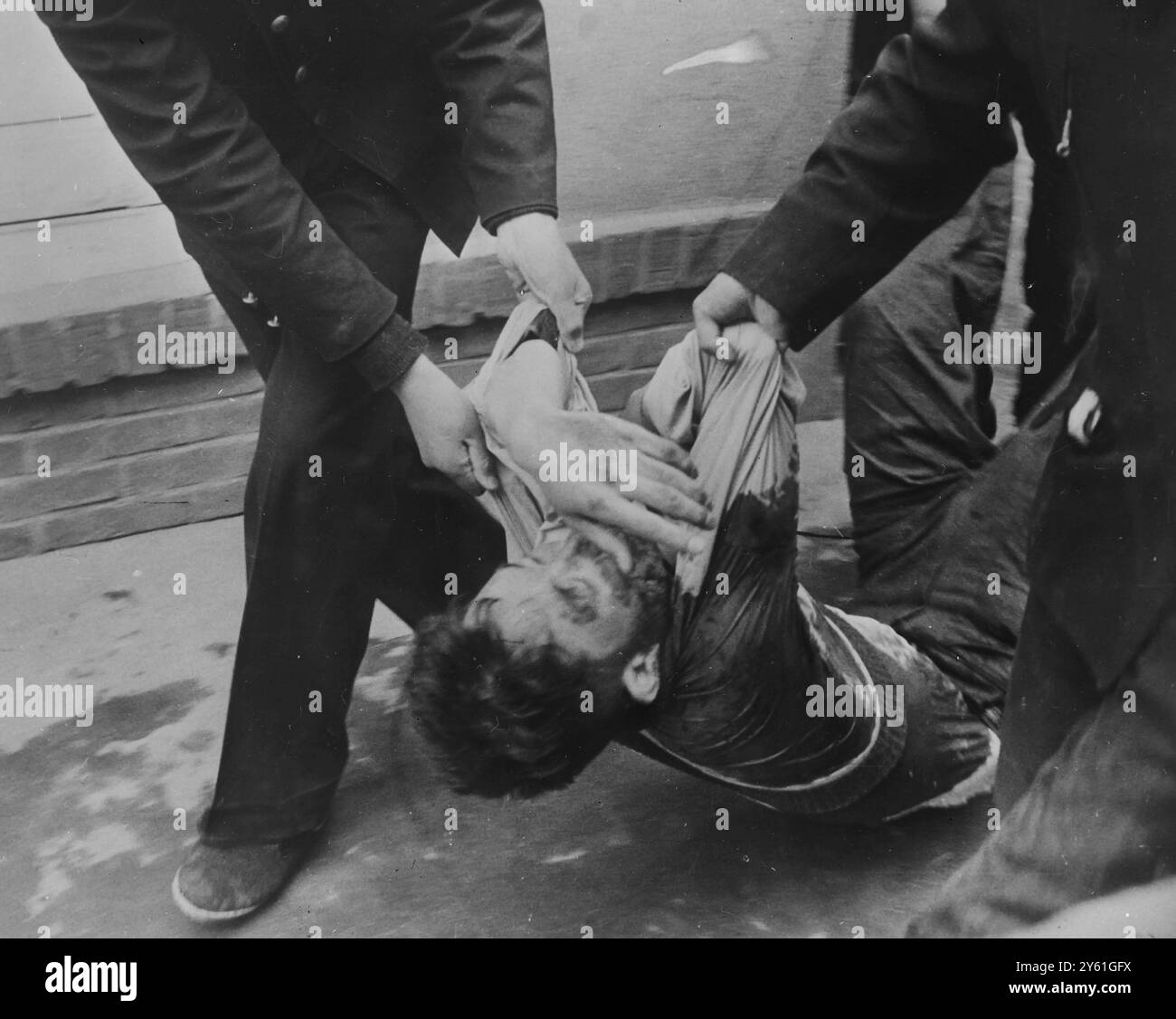 Police drag hi-res stock photography and images - Alamy