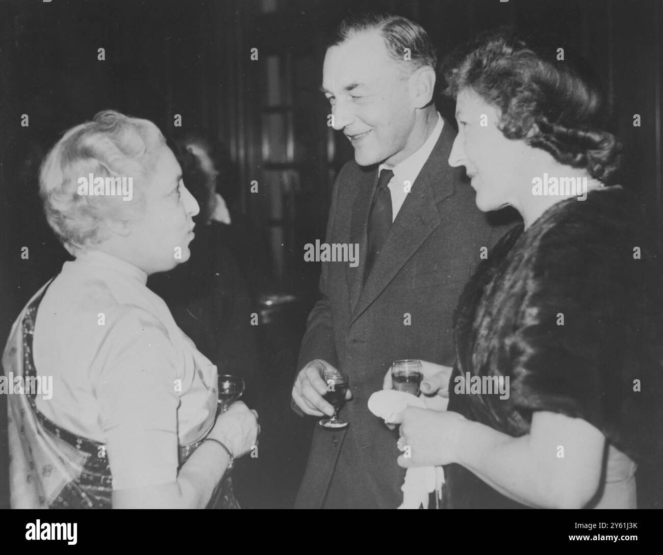 VIJANA LAKSHMI PANDIT WITH THOMAS AND LADY PIKE AT INDIAN AIR PARTY ...