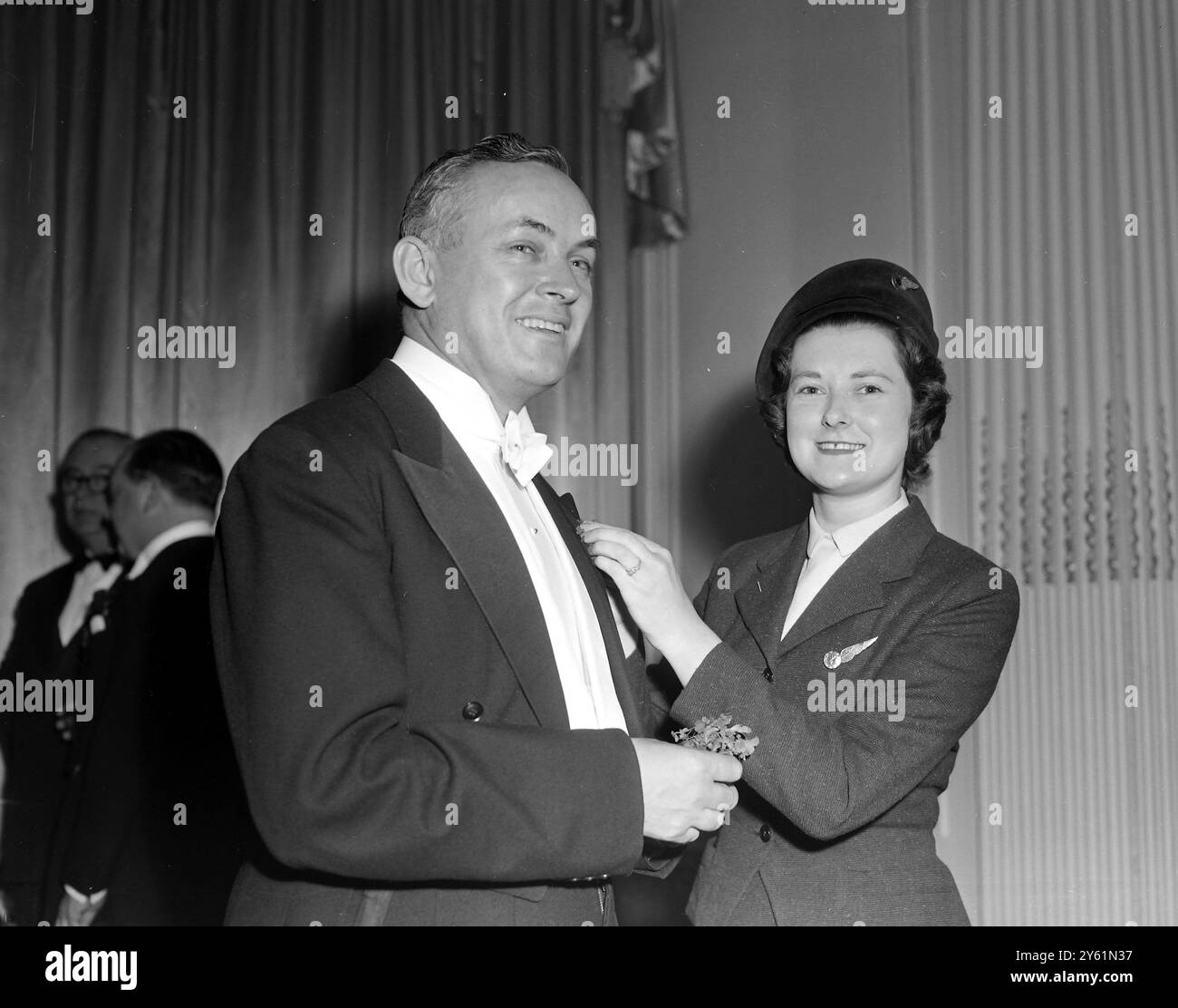 IRISH AMBASSADOR MR McCANN RECEIVING A SPRIG OF SHAMROCK FROM MARY RYAN ...