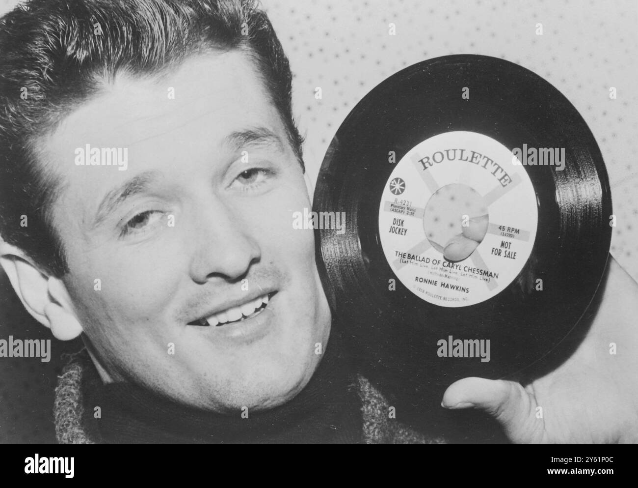 SINGER RONNIE HAWKINS HOLDING HIS RECORD " THE BALLARD OF CARYL ...