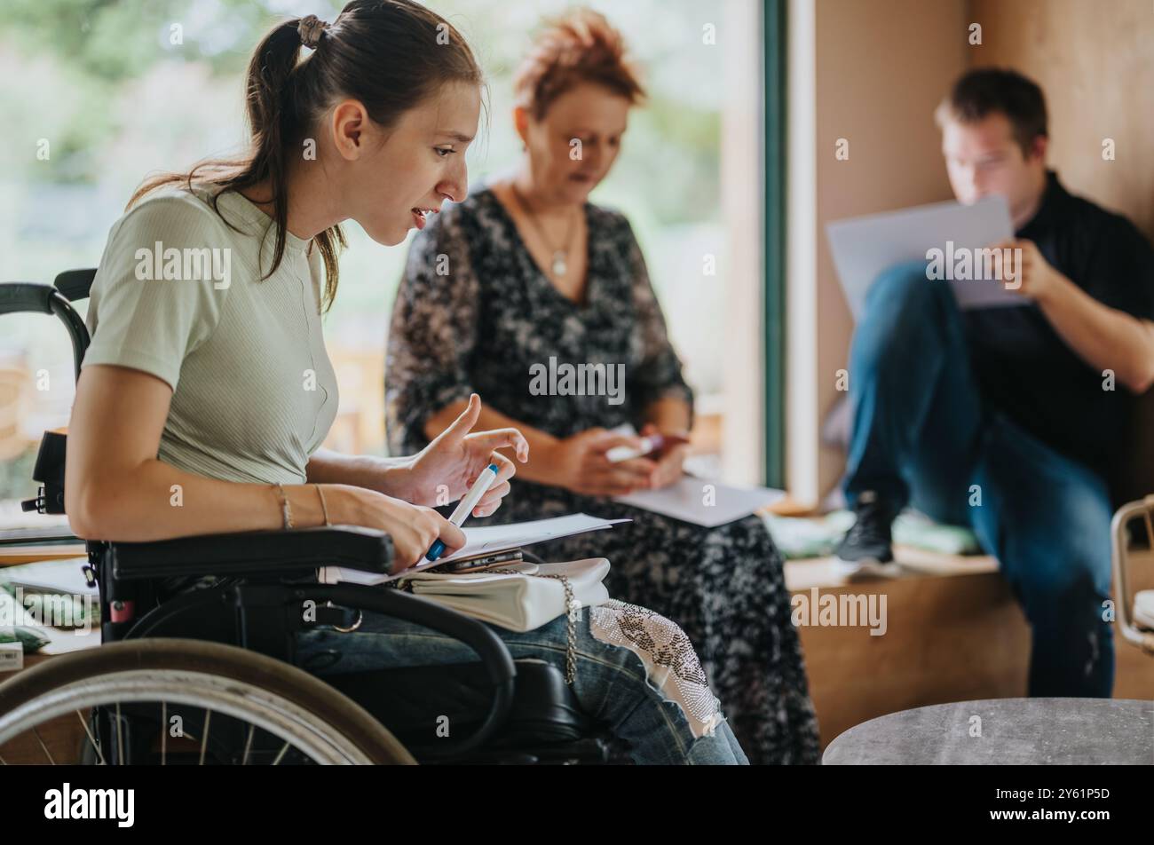 Diverse group collaborating in informal work environment Stock Photo ...