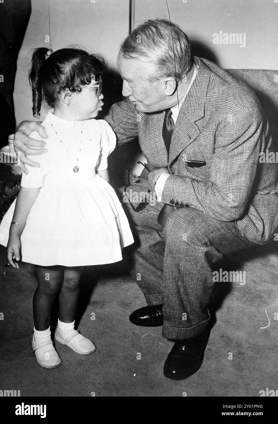 FRENCH ACTOR MAURICE CHEVALIER GREETED BY GIGI PETITCOLIN AT SYDNEY ...