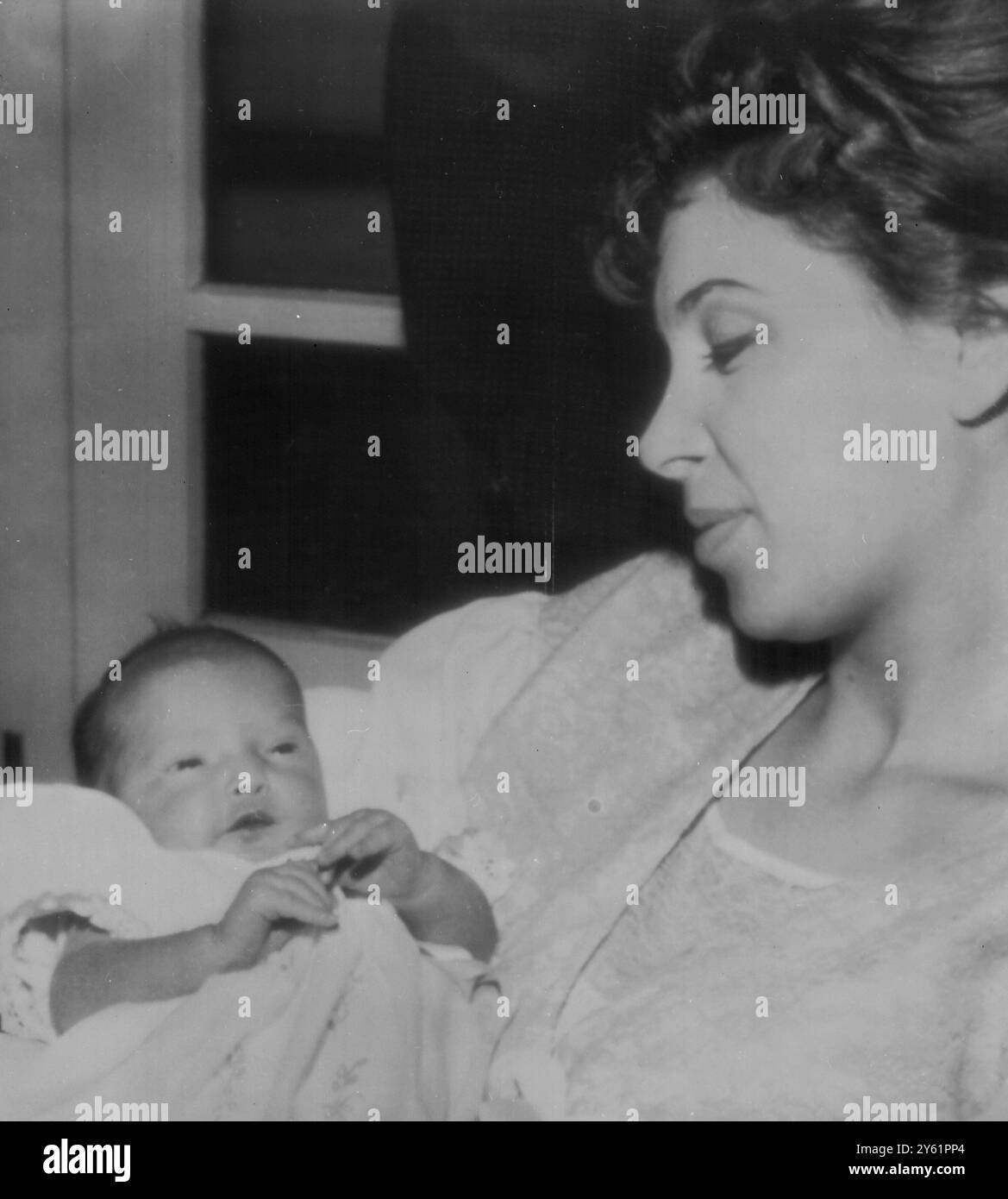 Lady holds up Black and White Stock Photos & Images - Alamy