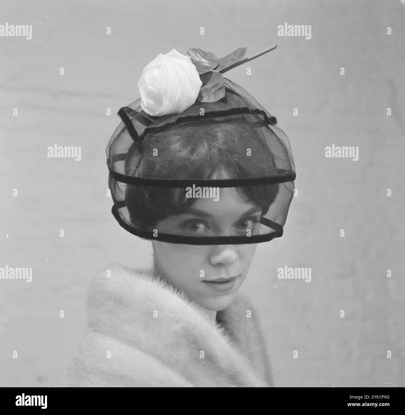 MODEL GLORIA TAYLOR WEARING A CAGE STYLE HAT DESIGNED BY CRAWFORD REED ...