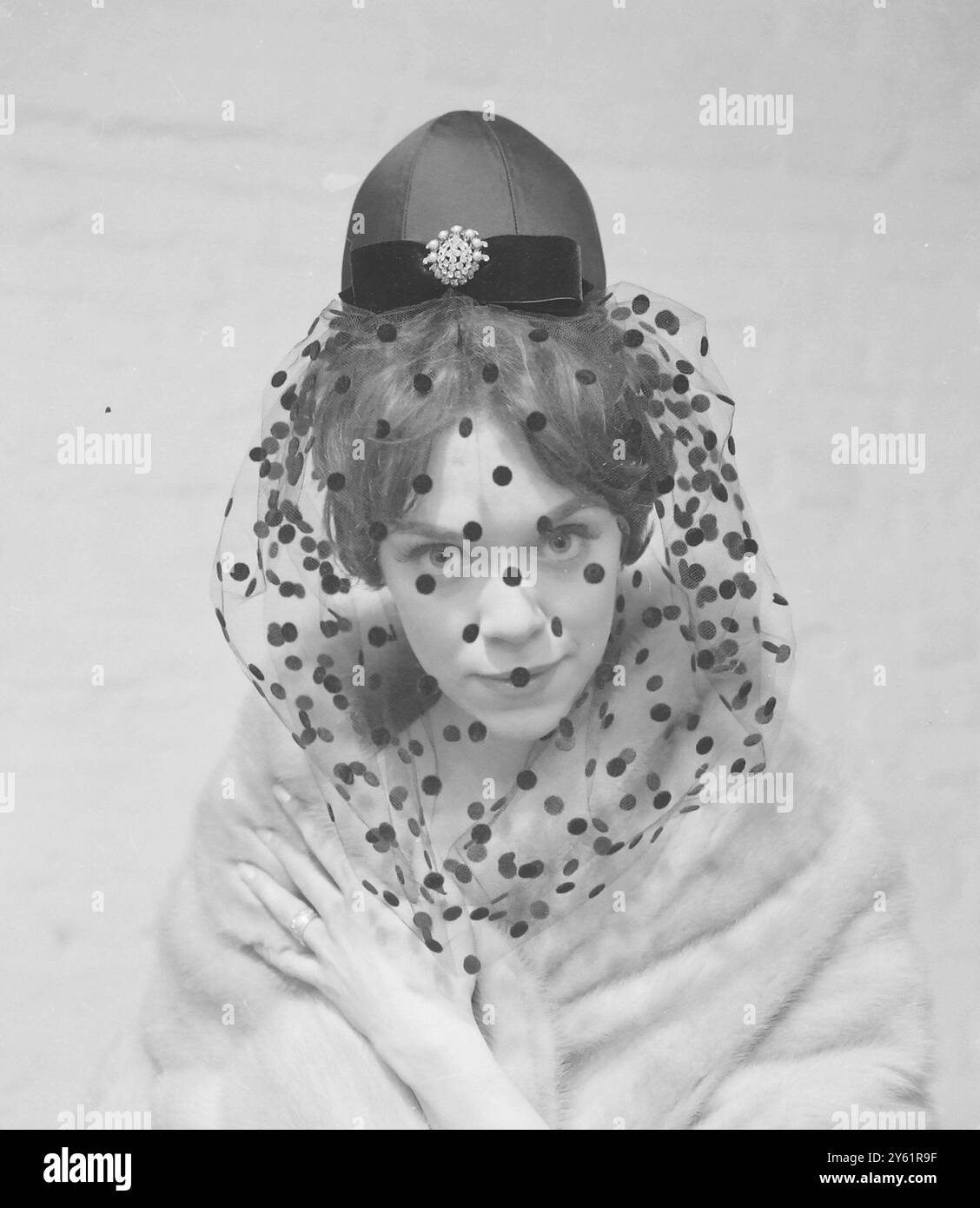 MODEL GLORIA TAYLOR WEARING AN ACORD STYLE HAT DESIGNED BY CRAWFORD ...