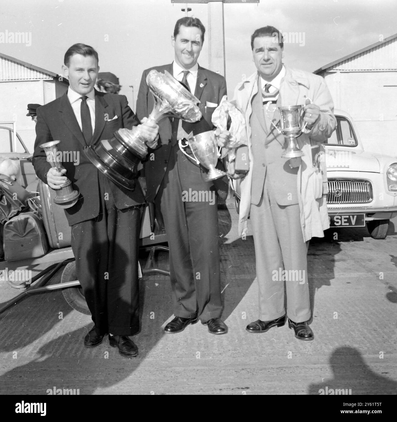BRUCE MCLAREN , JACK BRABHAM AND JOHN COOPER HOLDING RACING TROPHIES 17 ...