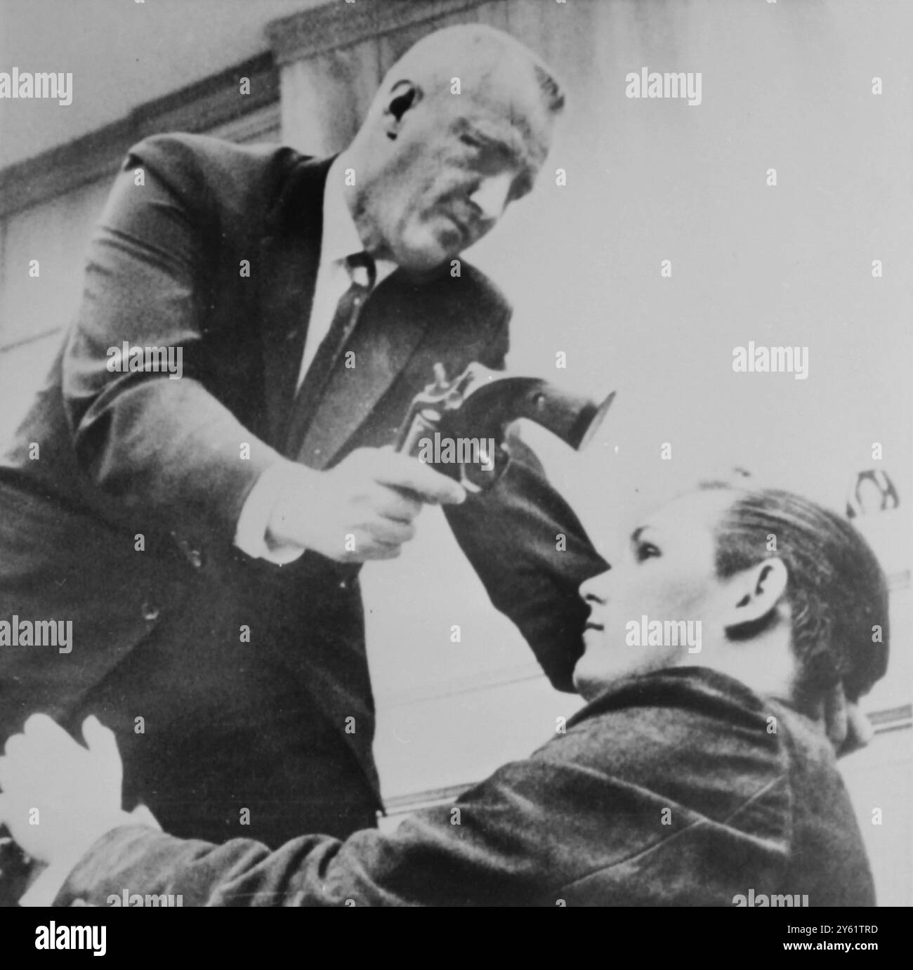 DR R BERNARD FINCH USES A GUN TO DEMONSTRATE HOW HE FRACTURED HIS WIFES ...