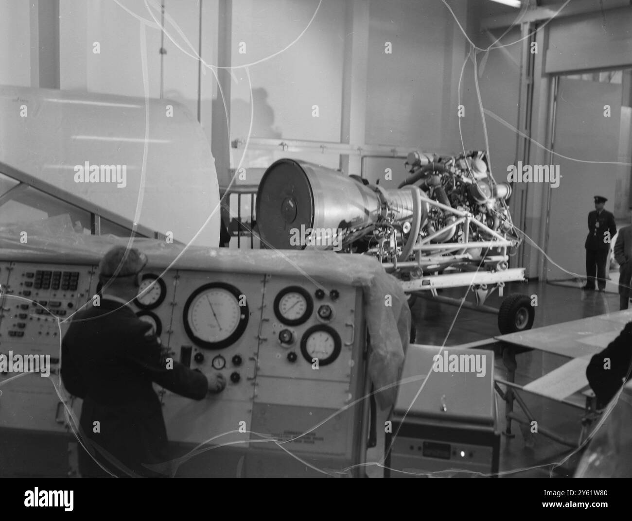 AT THE CONTROL PANEL IS ROCKET ENGINE CHECKER CHIEF TECHNICIAN JOHN G ...