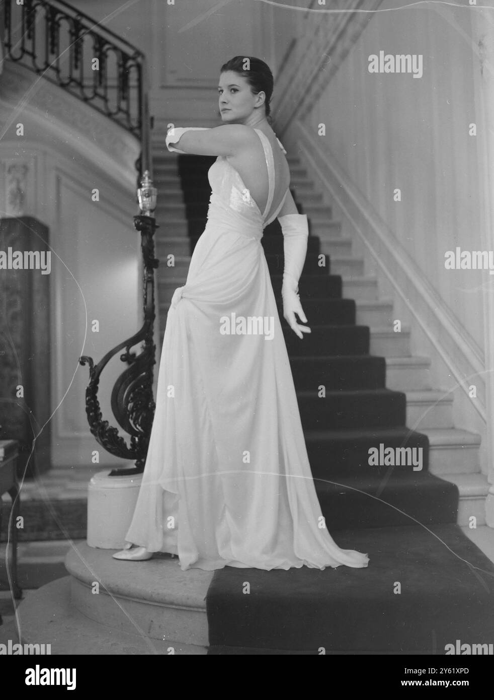 MODEL SUSAN NEVILLE SPORTING THIS EVENING DRESS CREATED BY FASHION ...