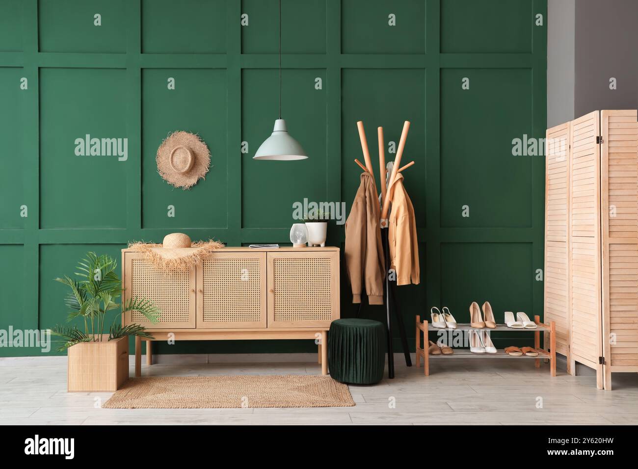 Interior of hall with commode, coat rack and shoe stand Stock Photo - Alamy