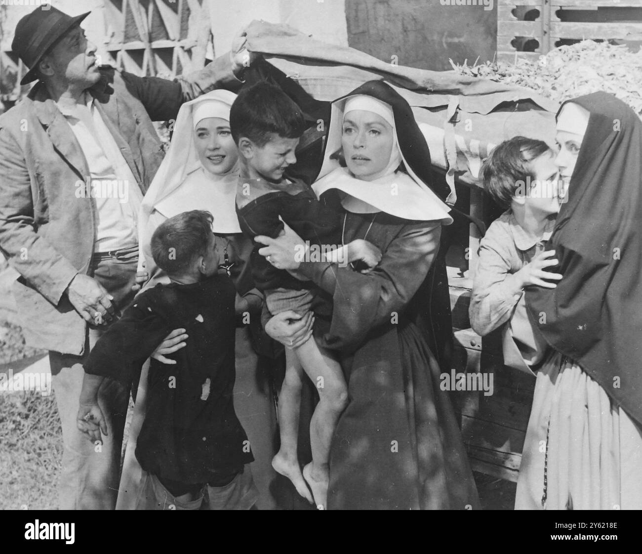 Nuns with children Black and White Stock Photos & Images - Alamy